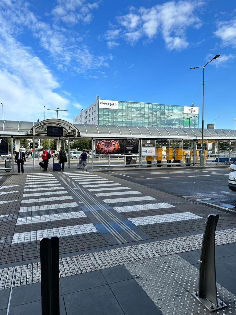 You pass through the public bus stops.